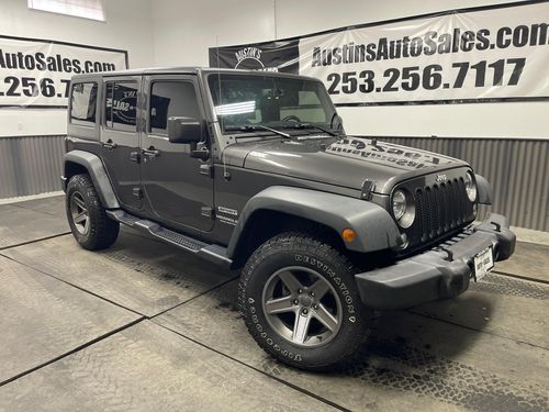 2013 Jeep Wrangler Unlimited Rubicon - Austin's Auto Sales